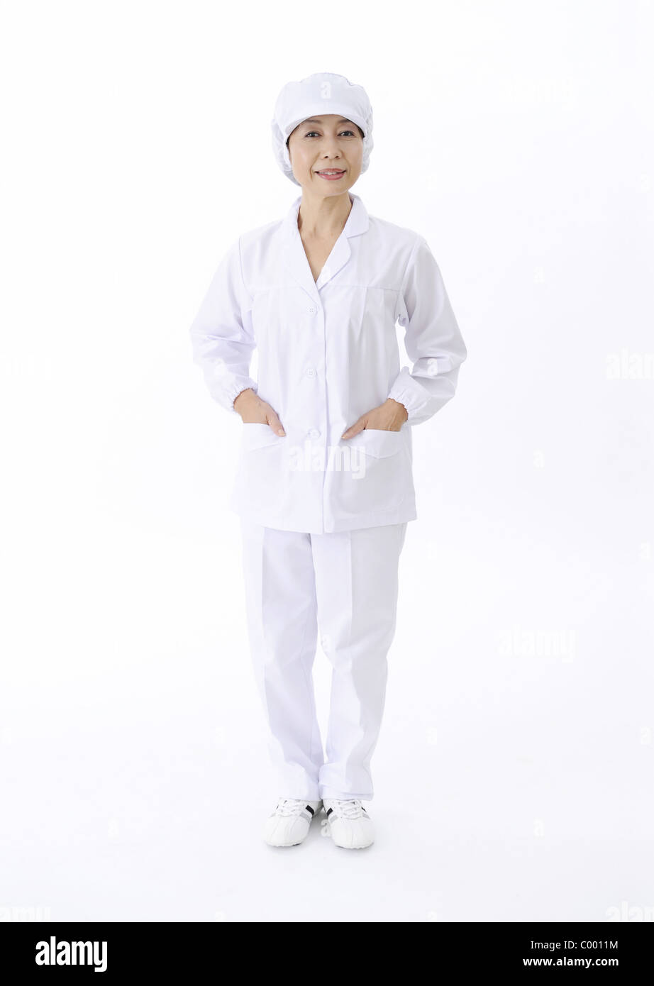 Factory worker wearing work clothing Stock Photo - Alamy