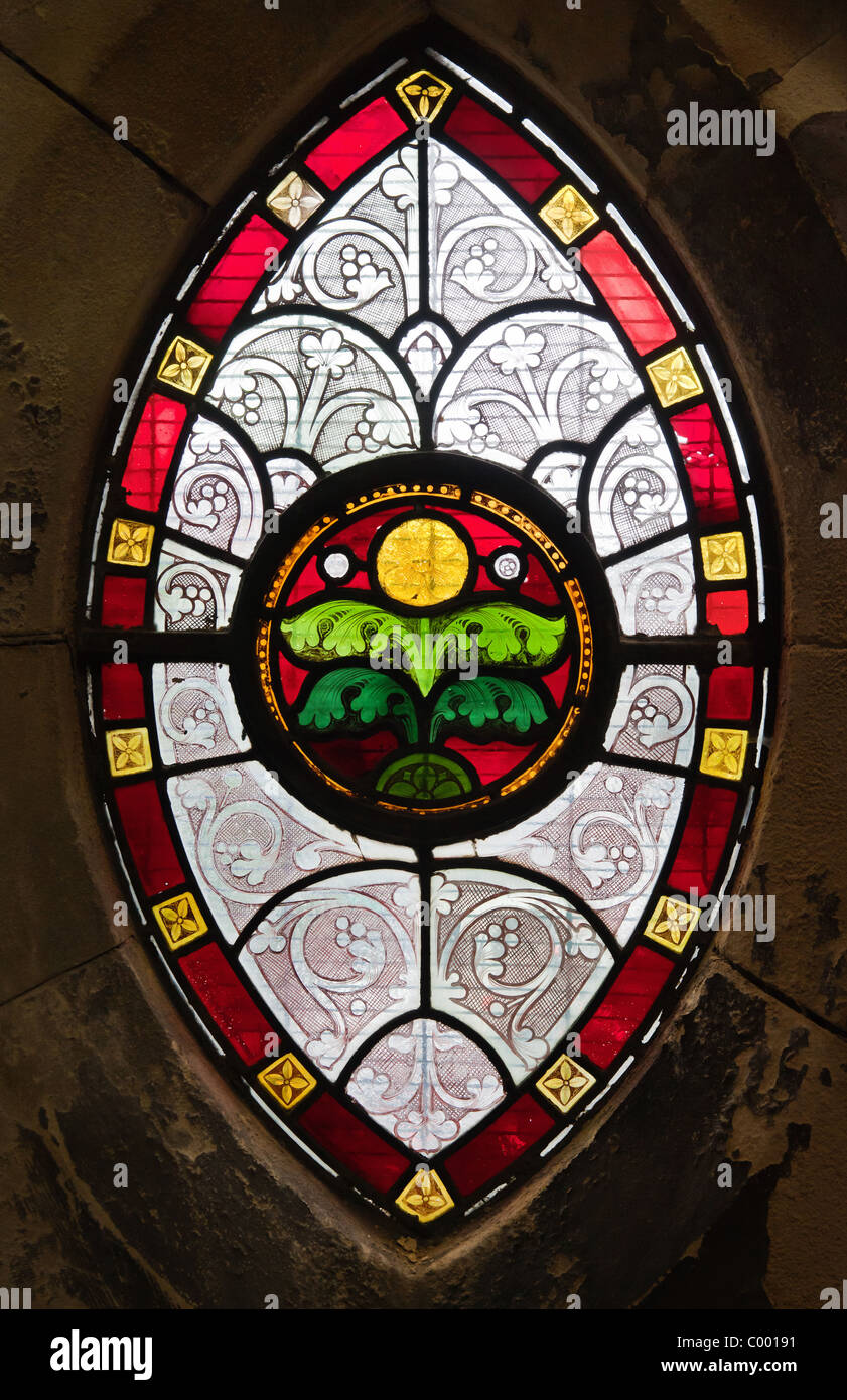 Gothic ornamental stained glass window in a medieval church Stock Photo ...
