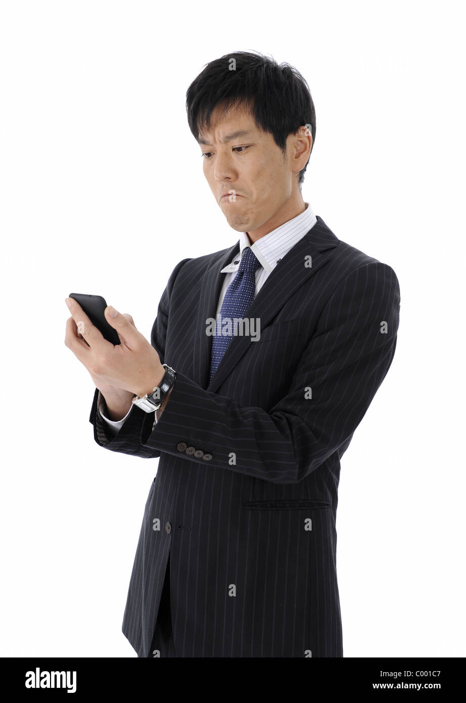 Businessman using cell phone Stock Photo - Alamy