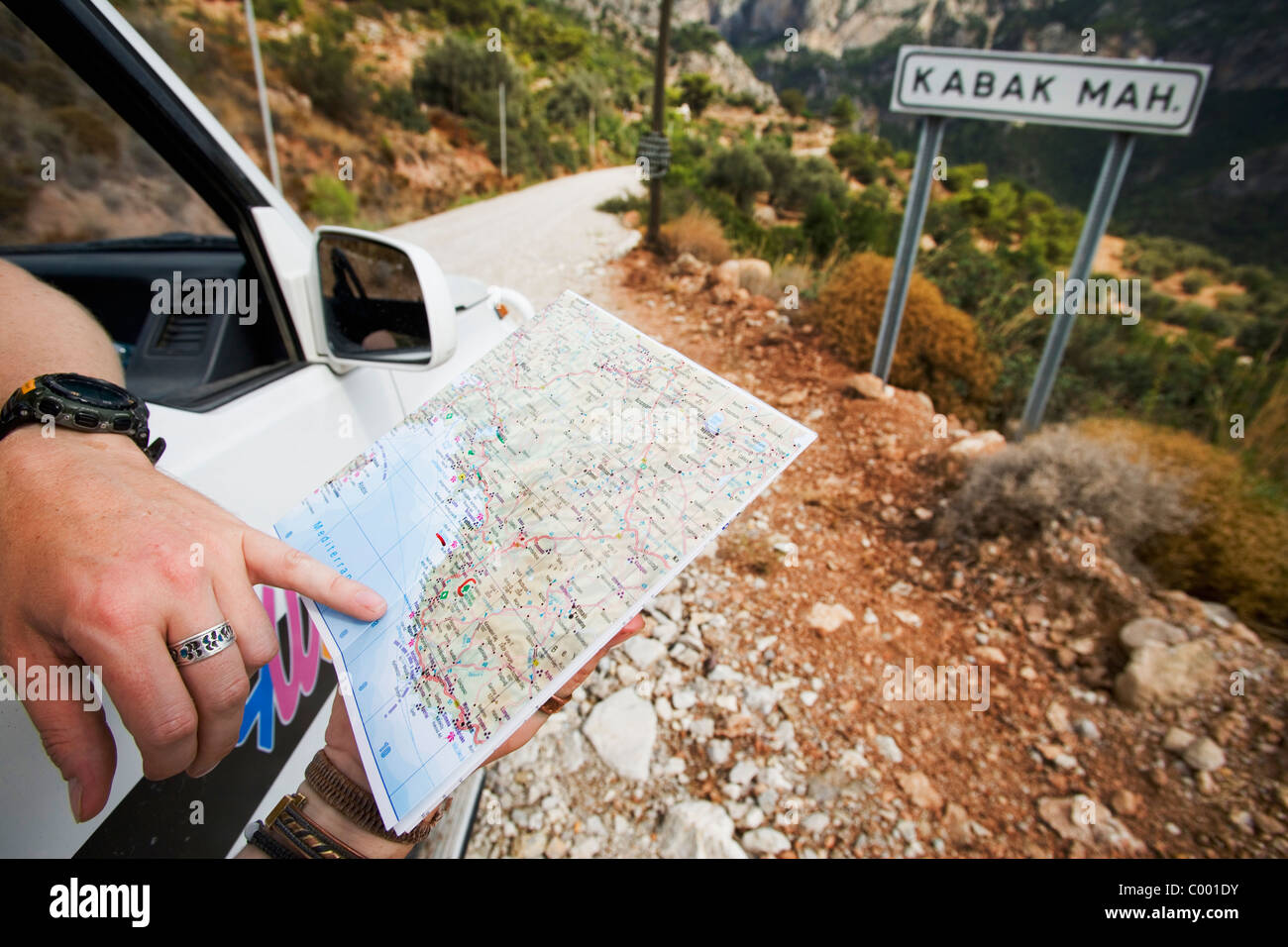 Tourist In Car Checking Map, Close Up Stock Photo - Alamy