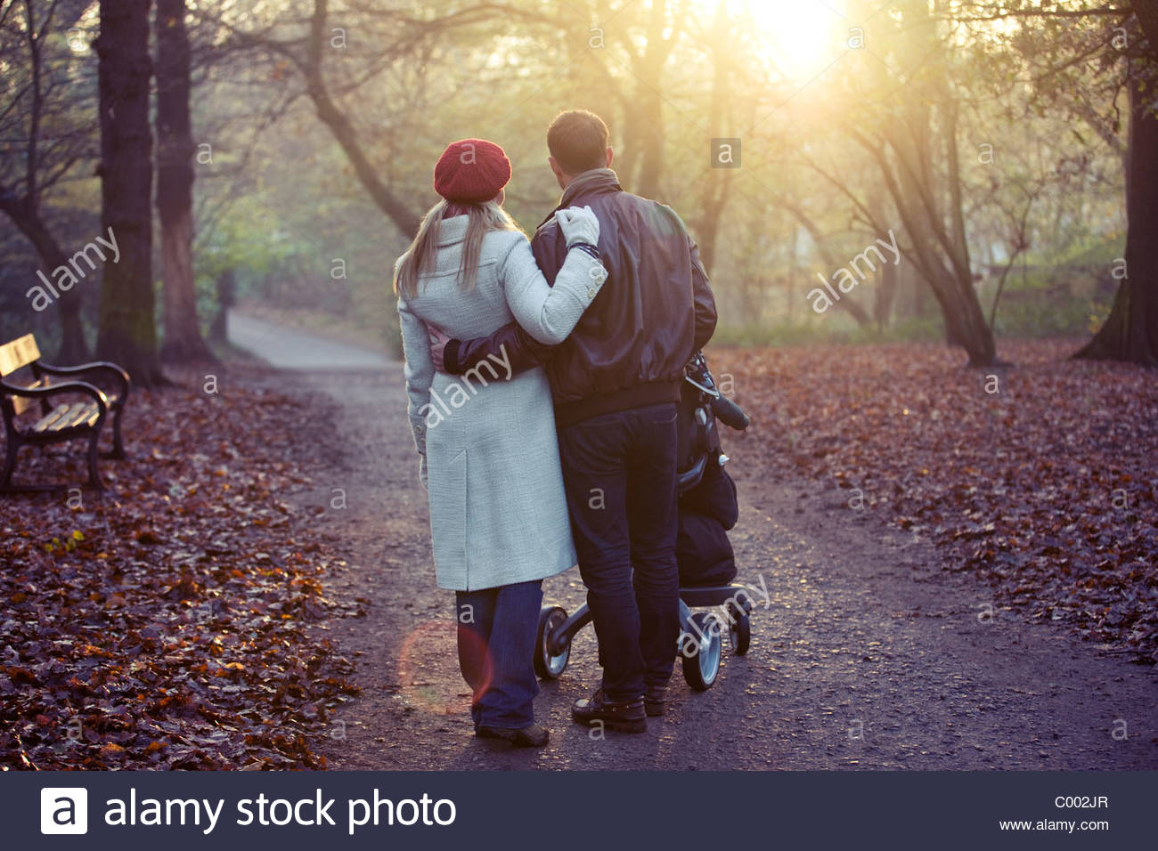 Woman Pushing A Stroller Stock Photos & Woman Pushing A Stroller Stock ...