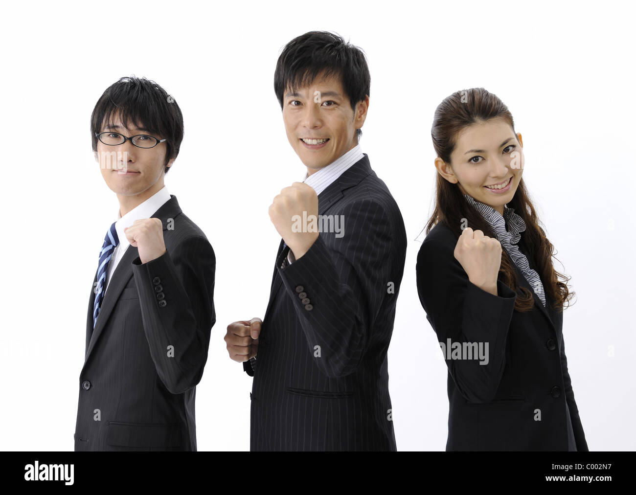 Business team pumping their first Stock Photo - Alamy