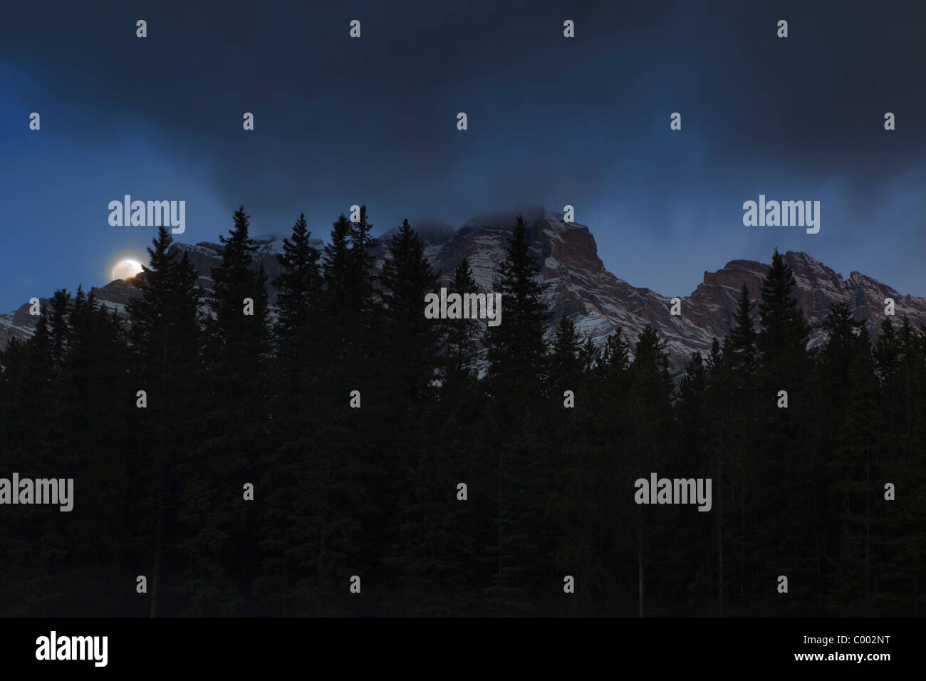 Moon behind mountain hi-res stock photography and images - Alamy