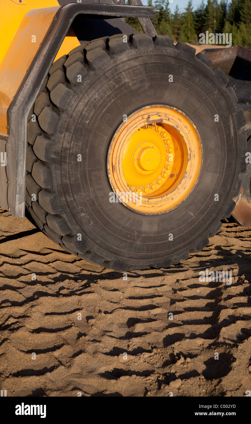 Front loader tyre and yellow wheel rim , Finland Stock Photo - Alamy