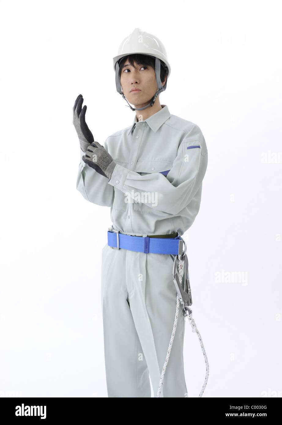 Construction worker preparing for work Stock Photo - Alamy