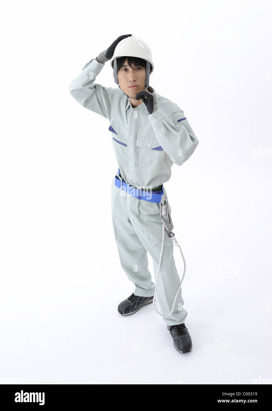 Construction worker preparing for work Stock Photo - Alamy