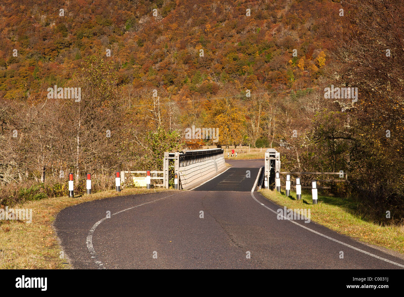 The bridge over the River Moidart flowing out to Loch Moidart in Autumn ...