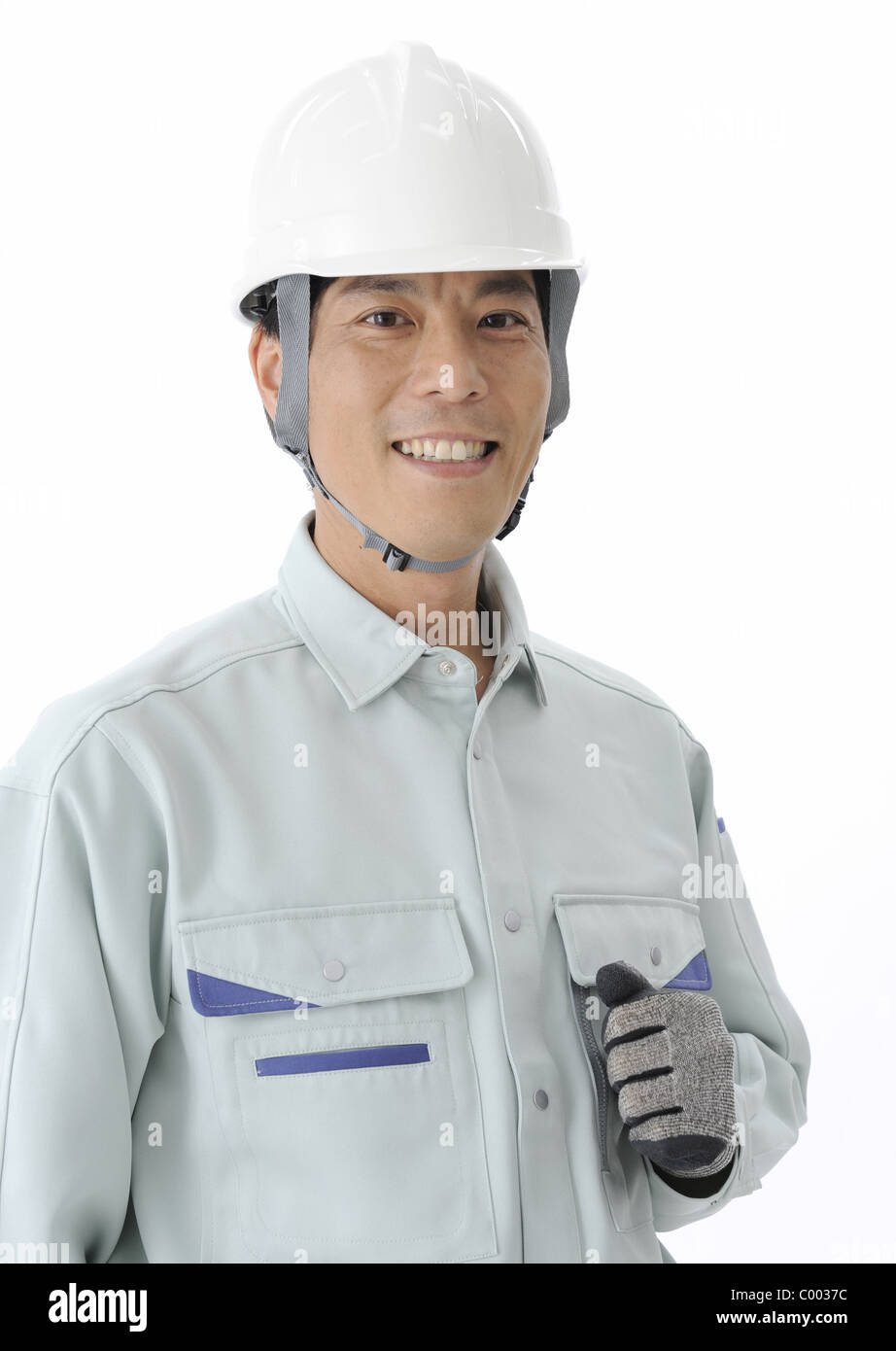 Smiling construction worker Stock Photo - Alamy
