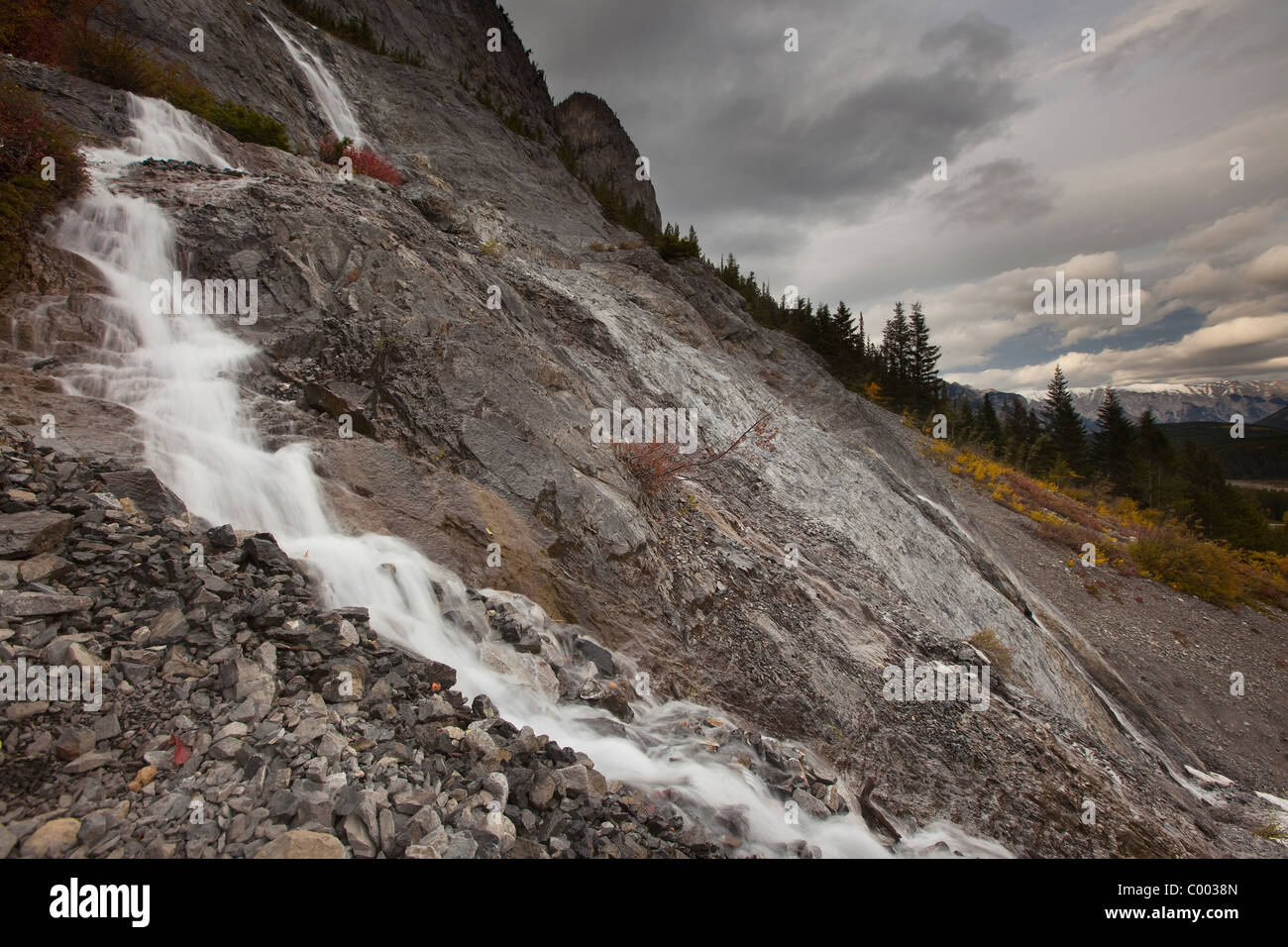 Waterfall cascading down mountain cliff, Banff National Park, Alberta Canada Stock Photo - Alamy