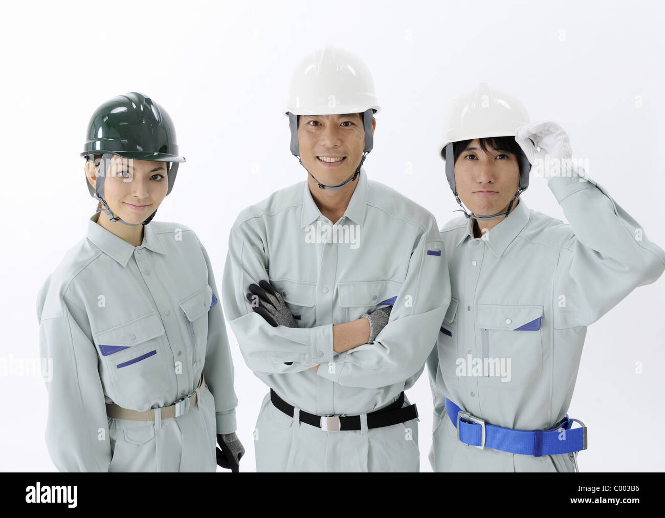 Three construction workers Stock Photo - Alamy