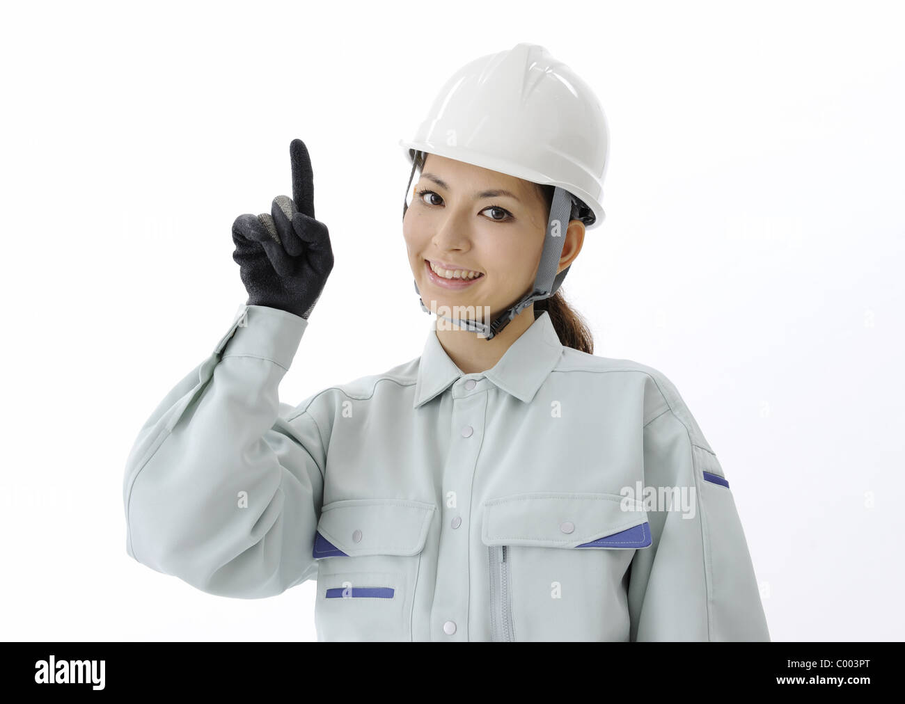 Construction worker pointing with her finger Stock Photo - Alamy