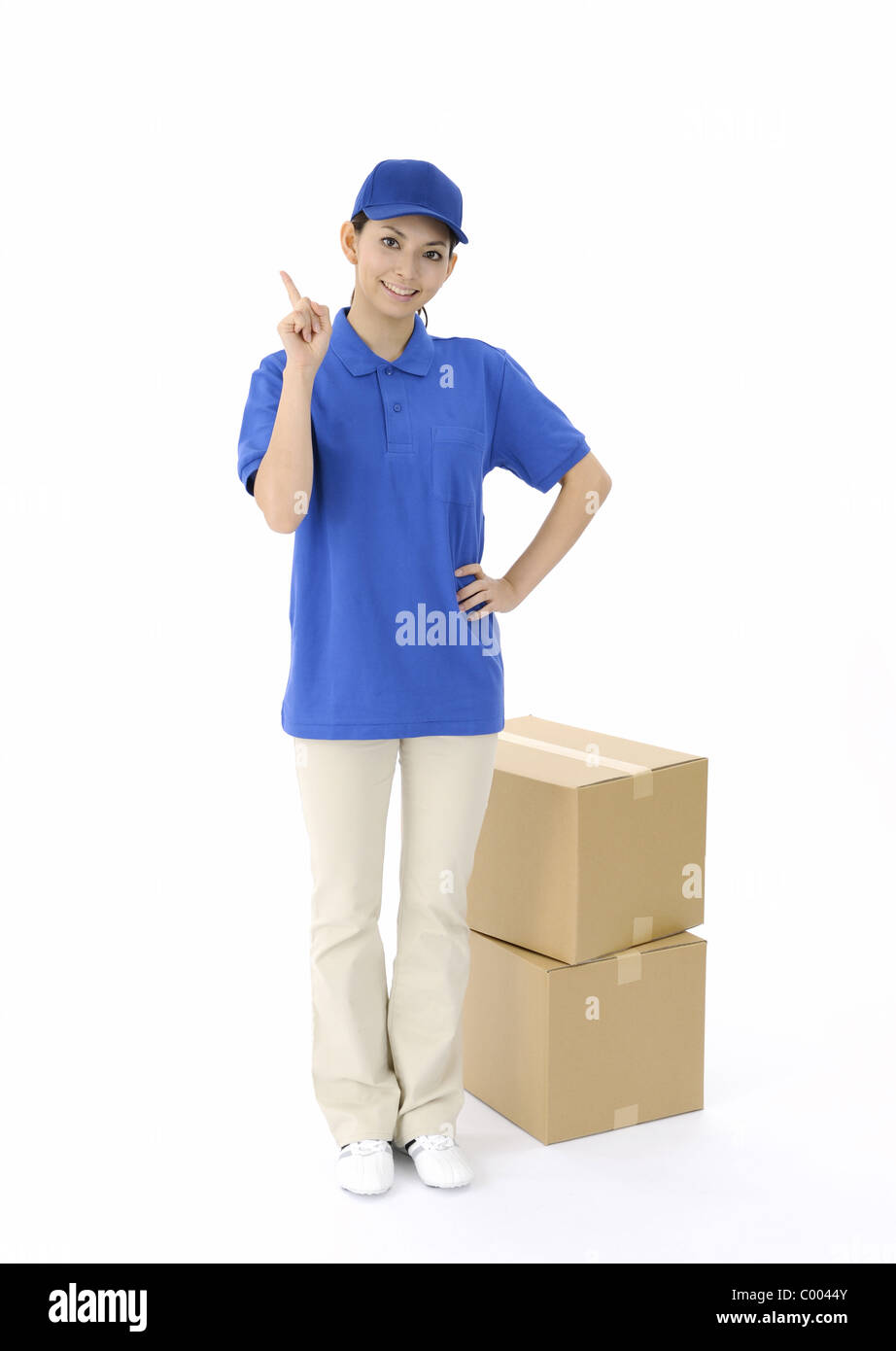 Young woman pointing cardboard Cut Out Stock Images & Pictures - Alamy