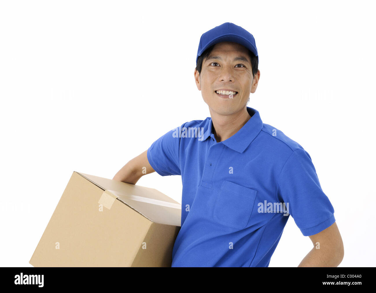 Deliverer carrying box Stock Photo - Alamy