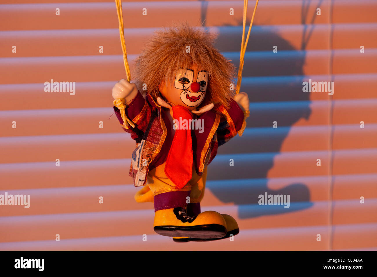 Dangling clown hi-res stock photography and images - Alamy
