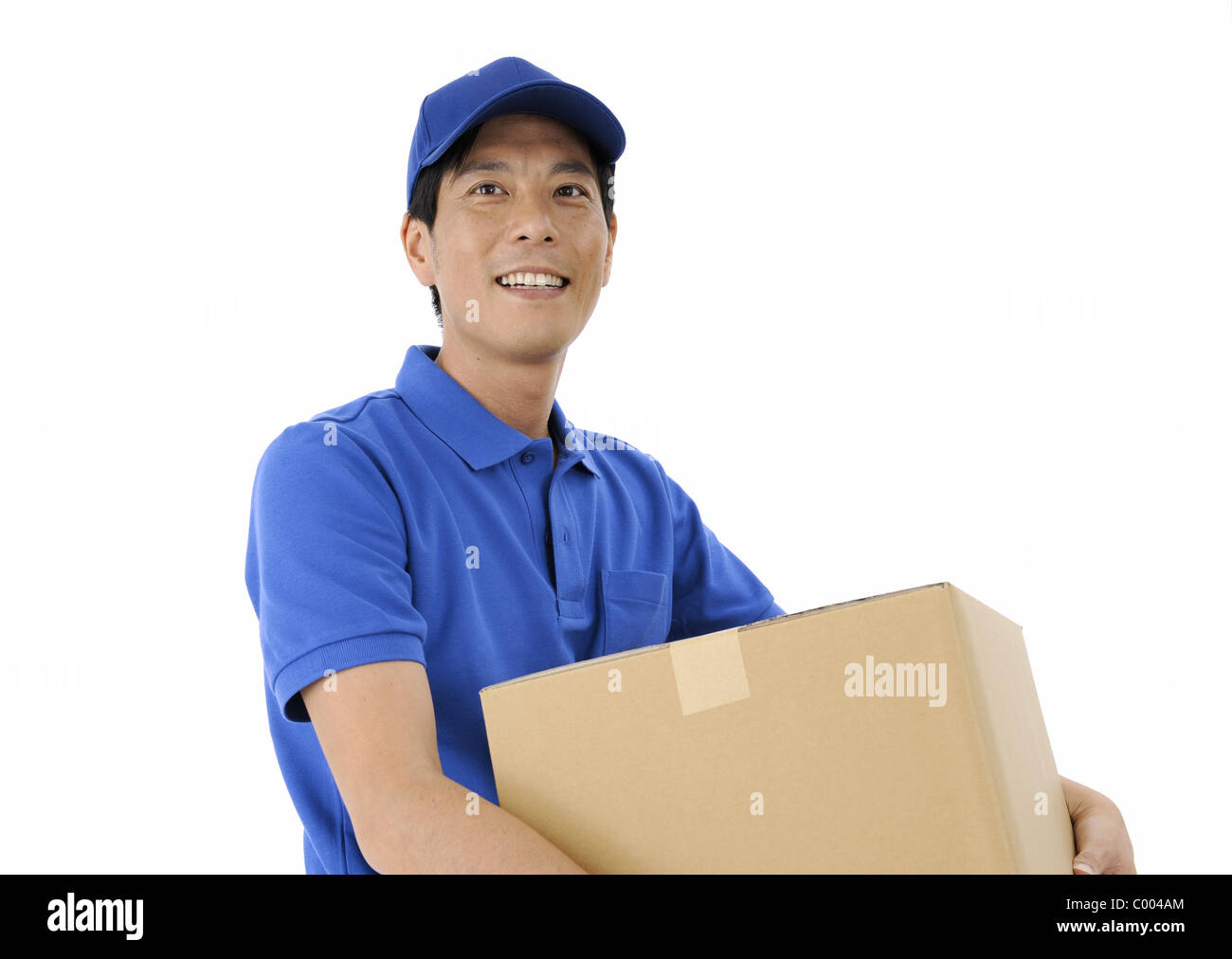 Deliverer carrying box Stock Photo - Alamy