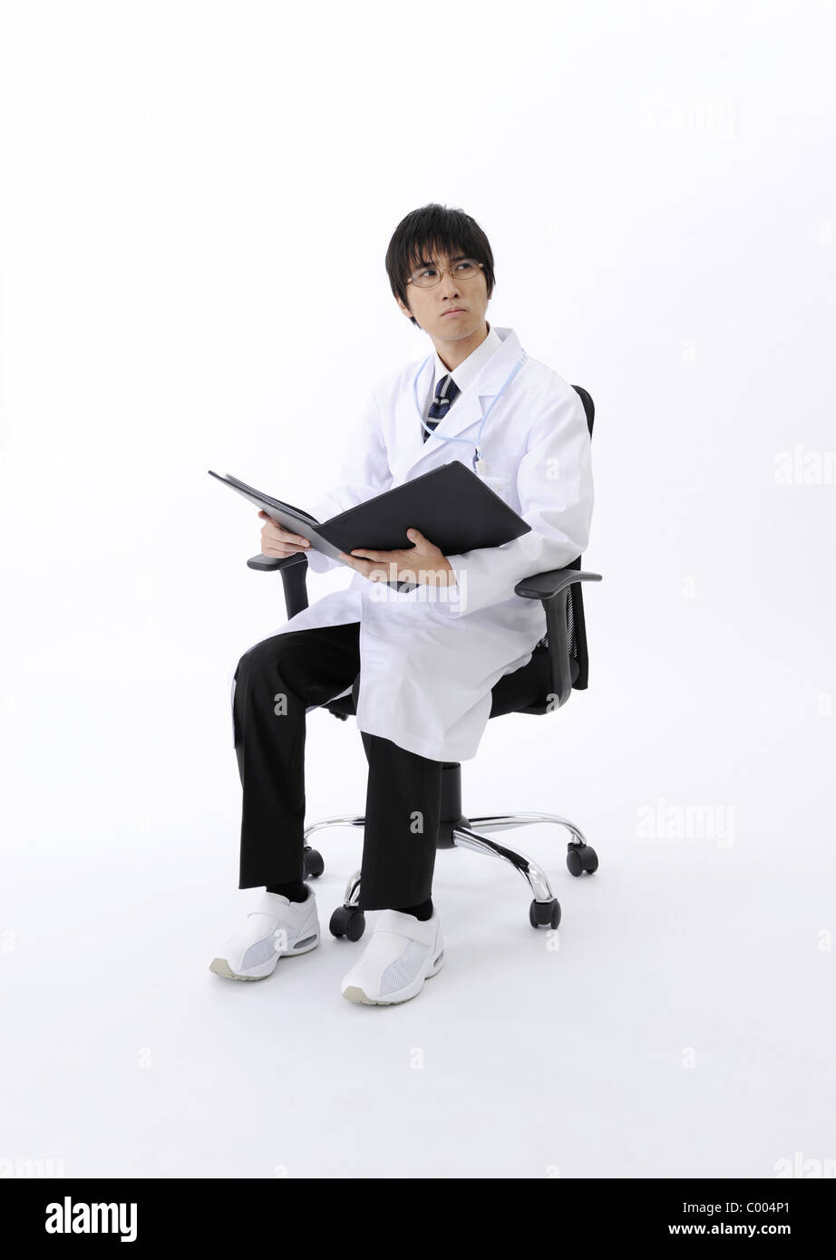 Lab worker sitting on chair Stock Photo - Alamy