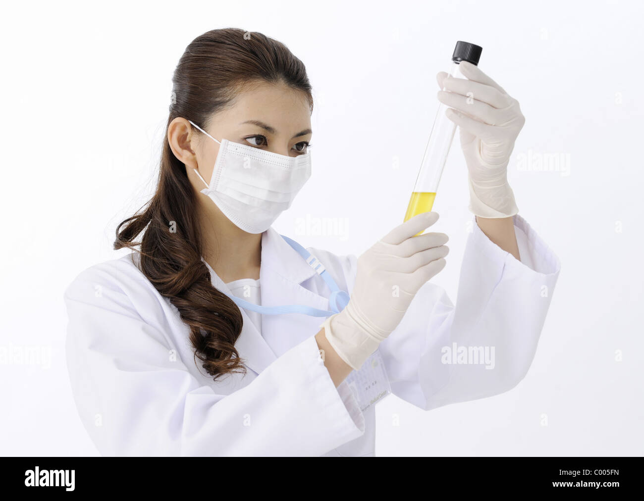 Lab worker experimenting Stock Photo - Alamy