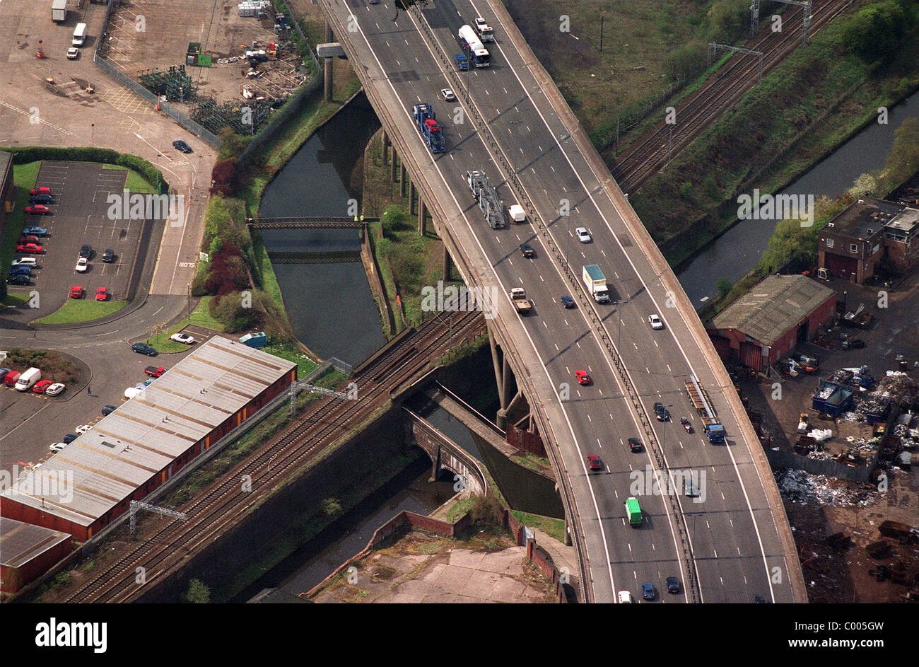 Aerial view M5 motorway crossing New Main Line canal in Sandwell with ...