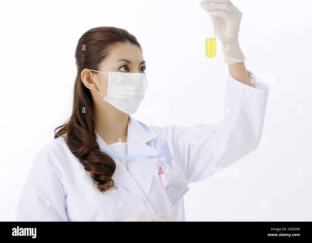 Lab worker experimenting Stock Photo - Alamy