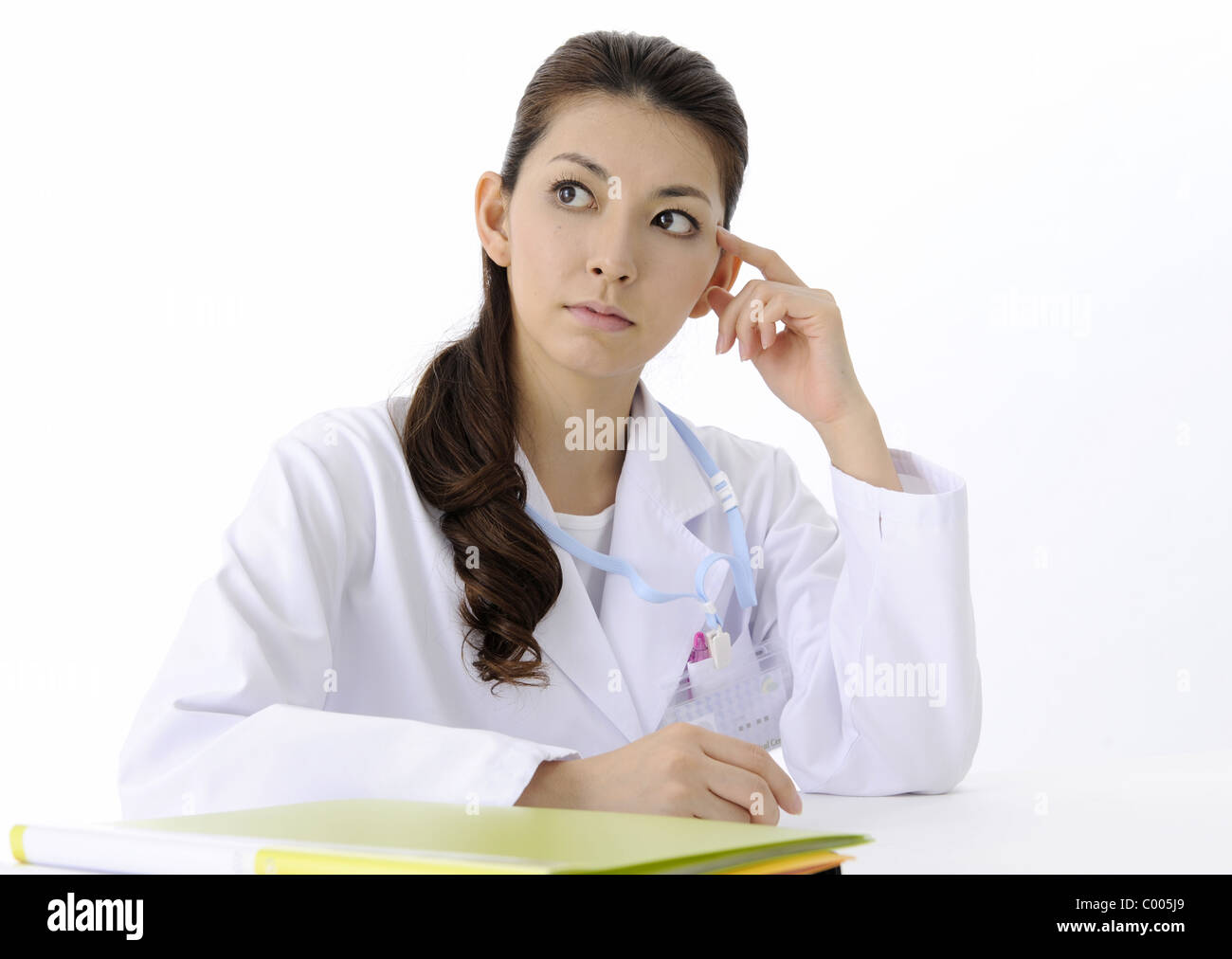 Lab worker thinking Stock Photo - Alamy