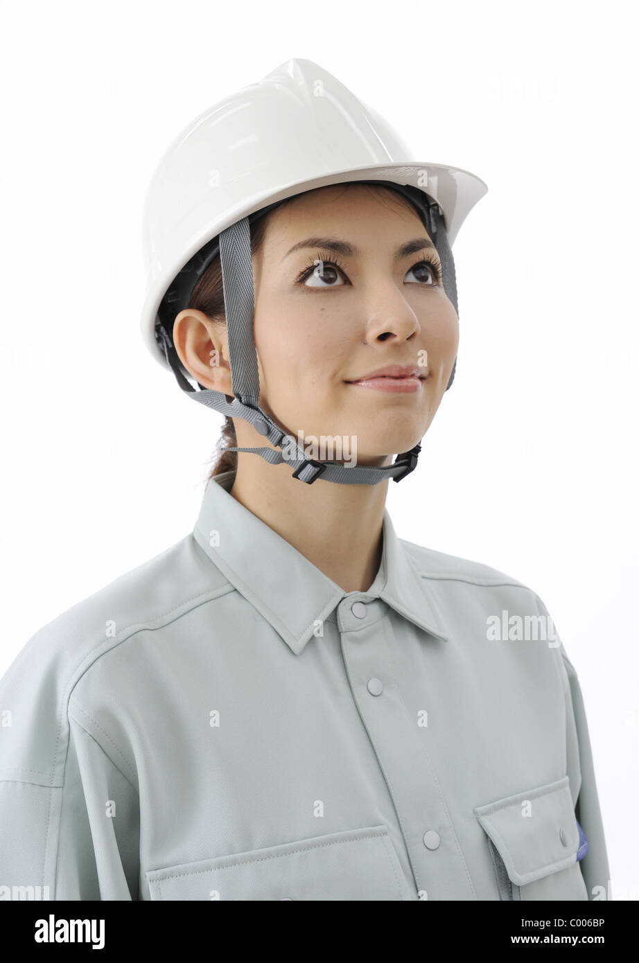 Worker looking up Stock Photo - Alamy