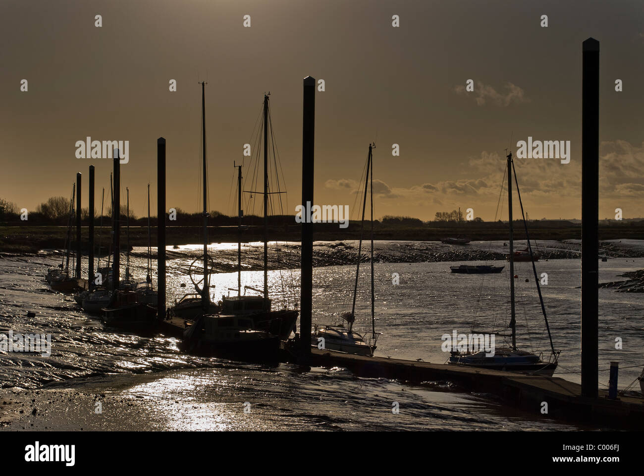 Early morning scene silhouette boats hi-res stock photography and ...