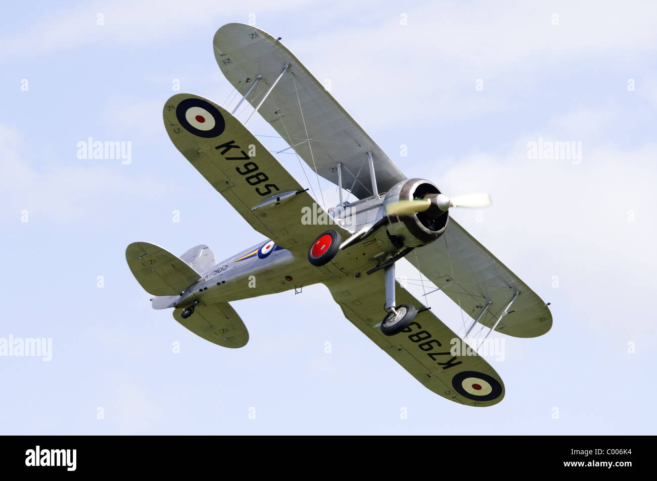 Gloster Gladiator Mk 1aircraft in RAF markings banking in for a low ...