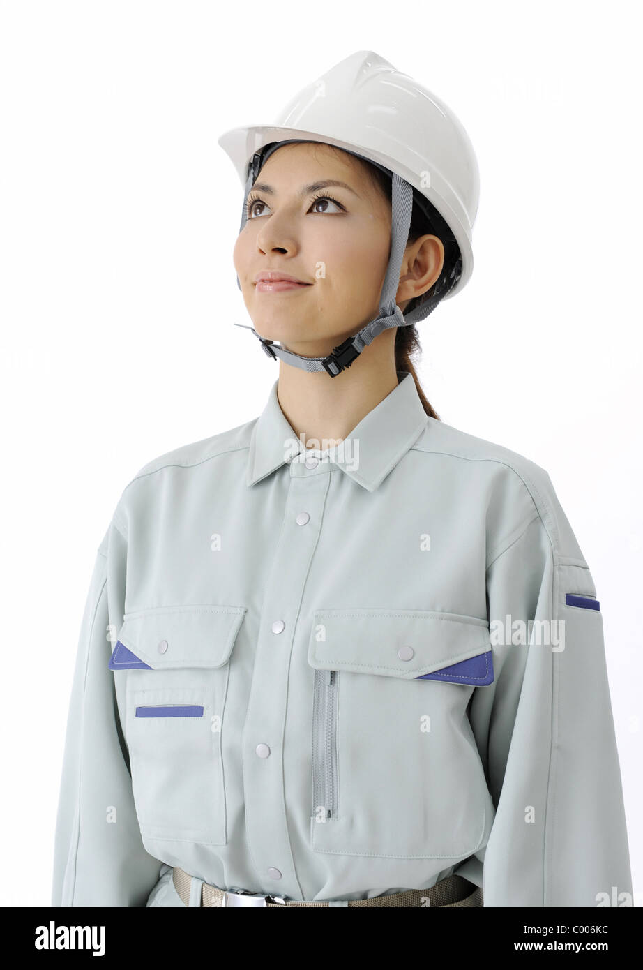 Worker looking up Stock Photo - Alamy