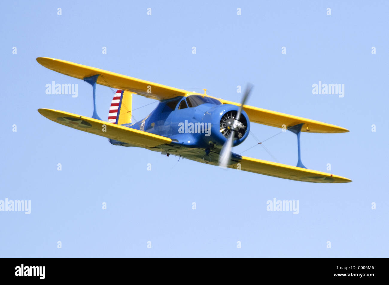 Beech YC-43 Traveller (Staggerwing) biplane making a low flypast at ...