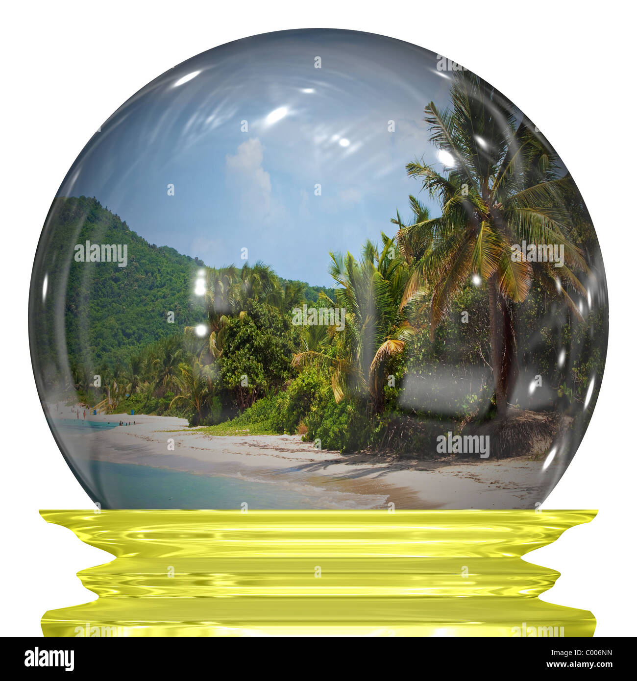 A snow globe with an image of a tropical caribbean beach in the middle ...