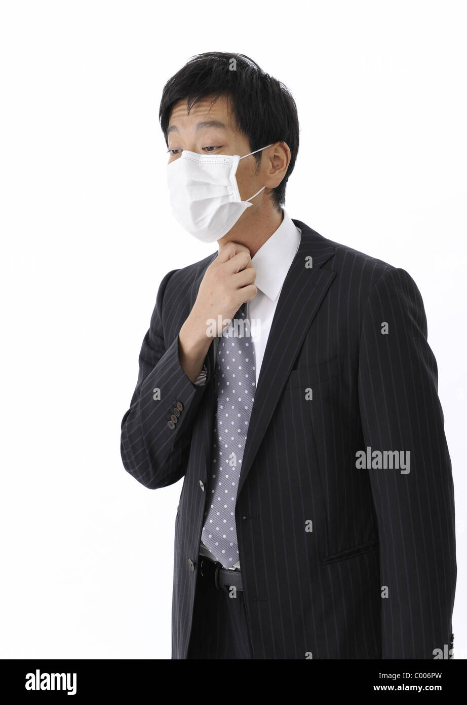 Businessman wearing mask Stock Photo - Alamy