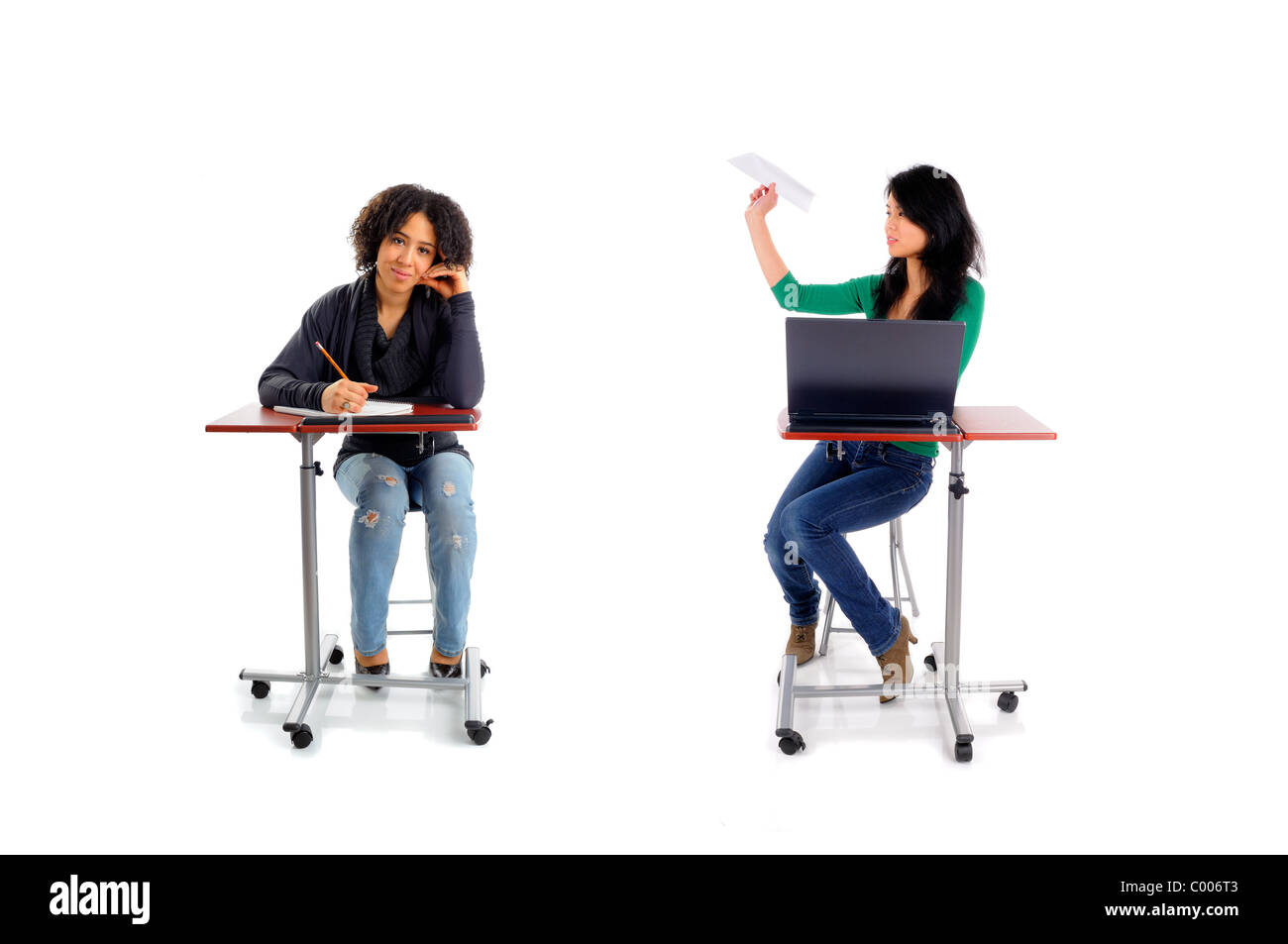 Two Students Sat At Desks In School Stock Photo - Alamy