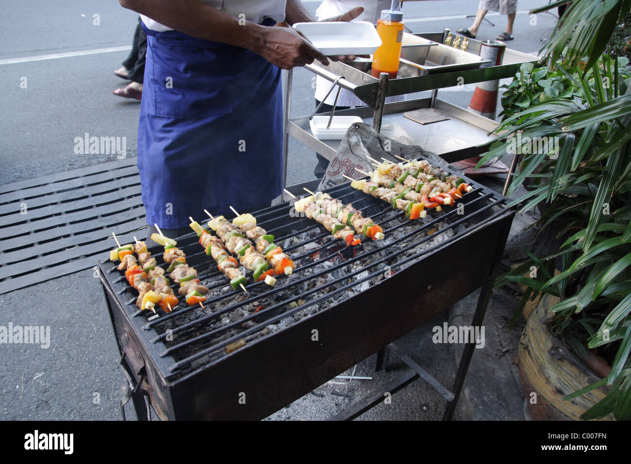 BBQ seller on street in Bangkok Stock Photo - Alamy