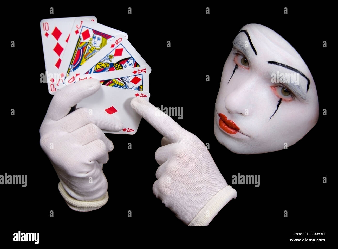 Portrait of mime with playing cards Stock Photo - Alamy
