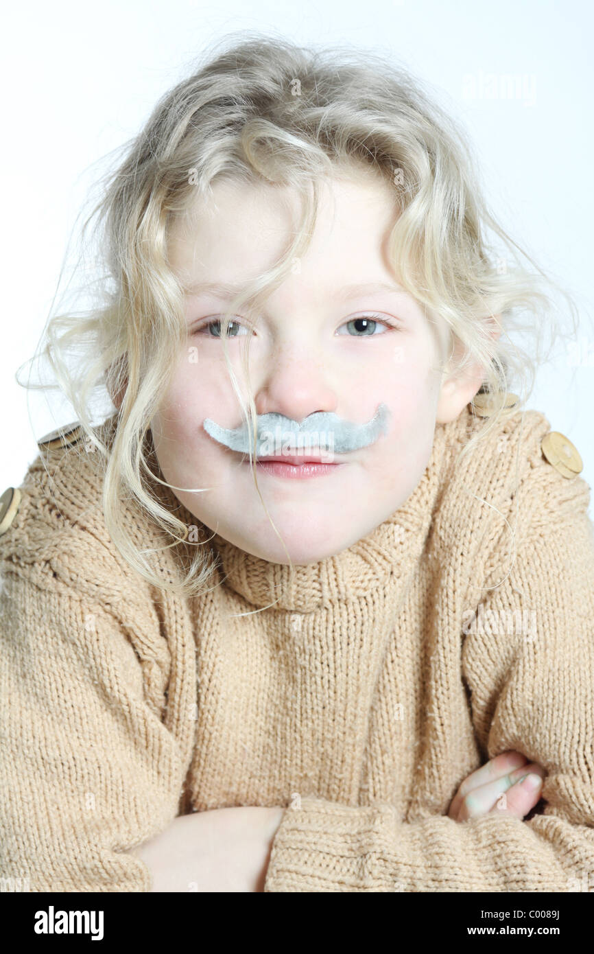 A blond girl with a grey moustache stuck on, hunched over pretending to ...