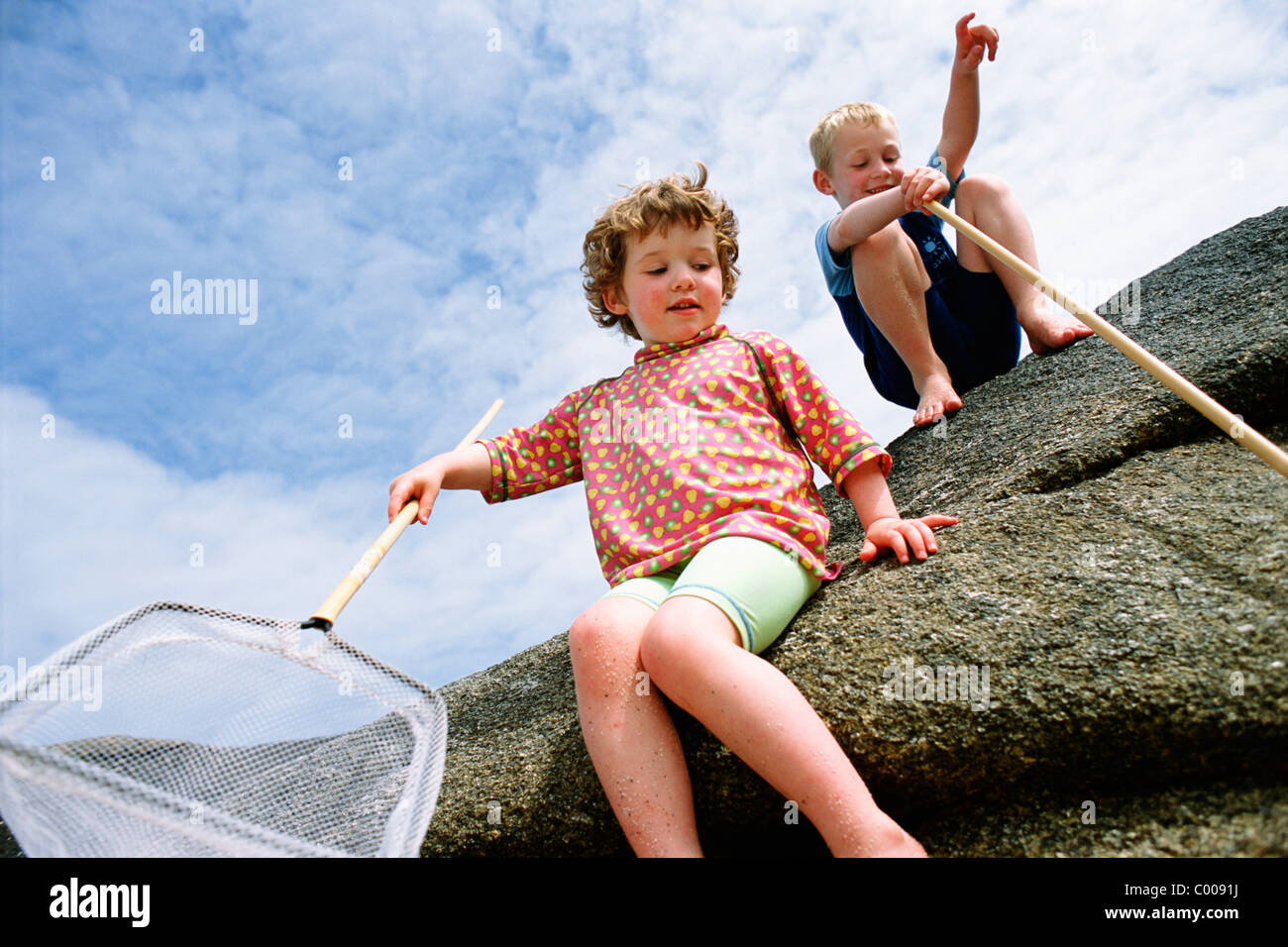 Rock pooling children hi-res stock photography and images - Alamy