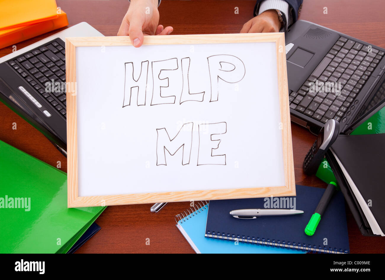 businessman asking for help (hiding his head Stock Photo - Alamy