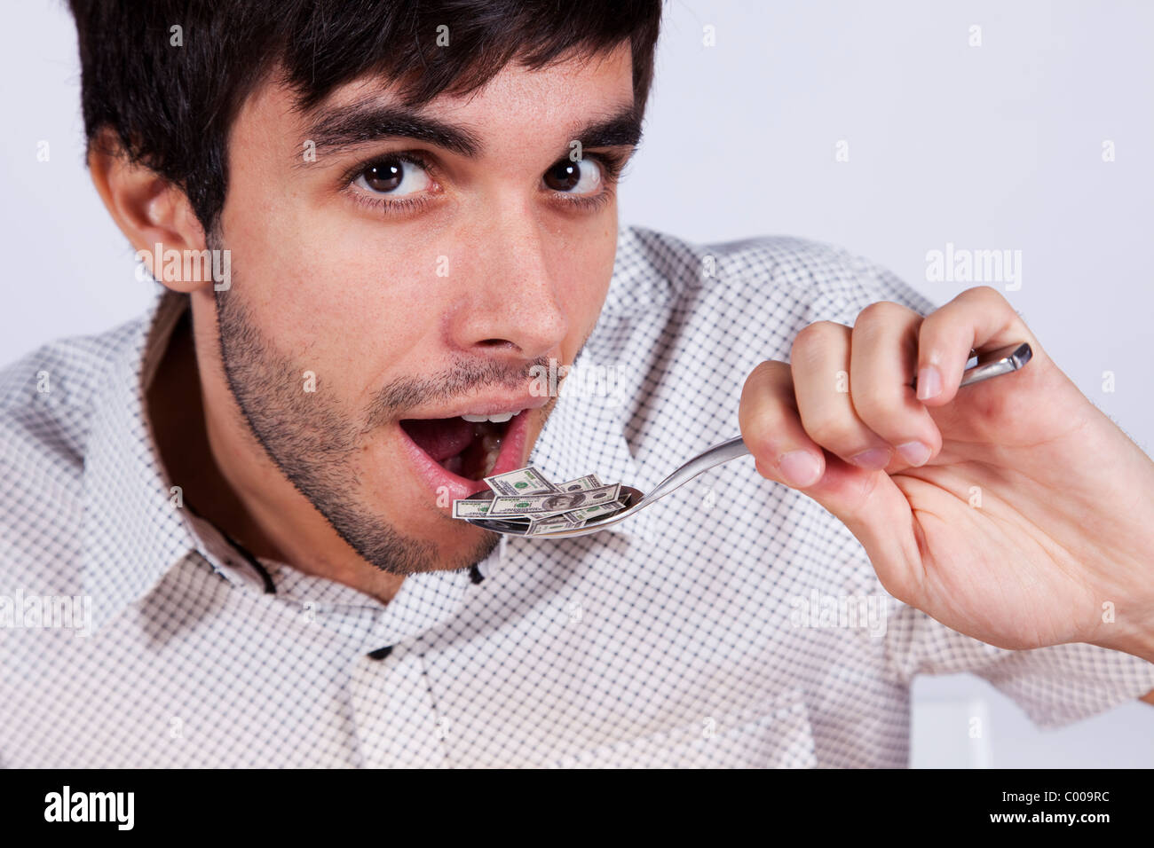 Eating greedy man hi-res stock photography and images - Alamy