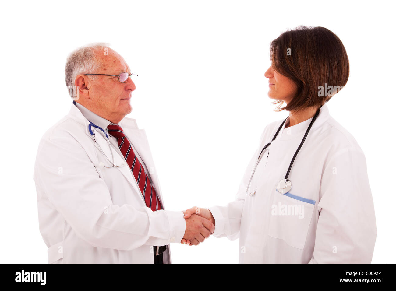 handshake of a team of doctors (isolated on white Stock Photo - Alamy