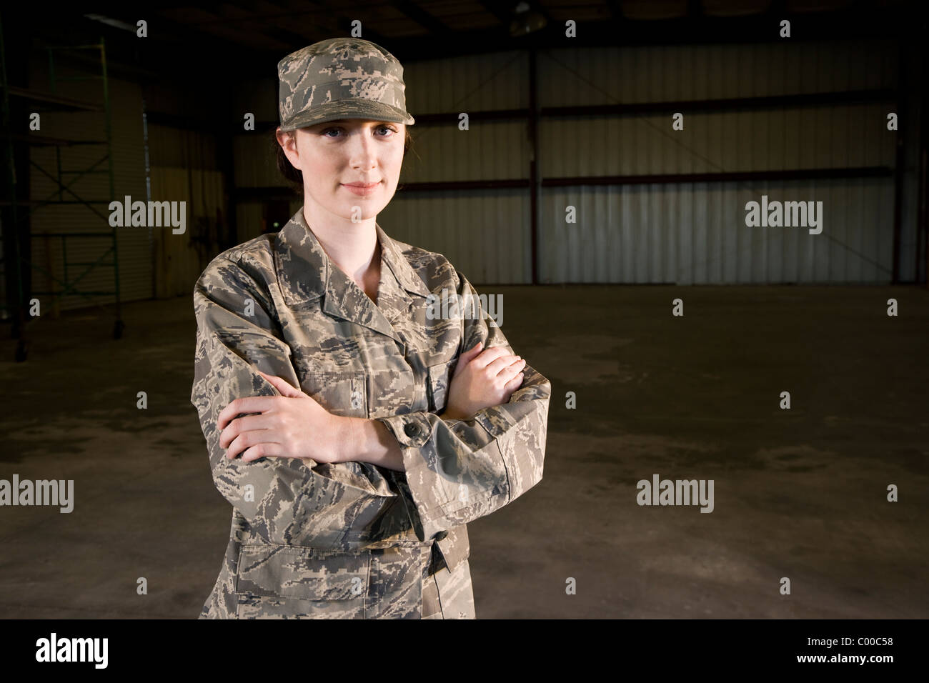 Young woman in army combat uniform Stock Photo - Alamy