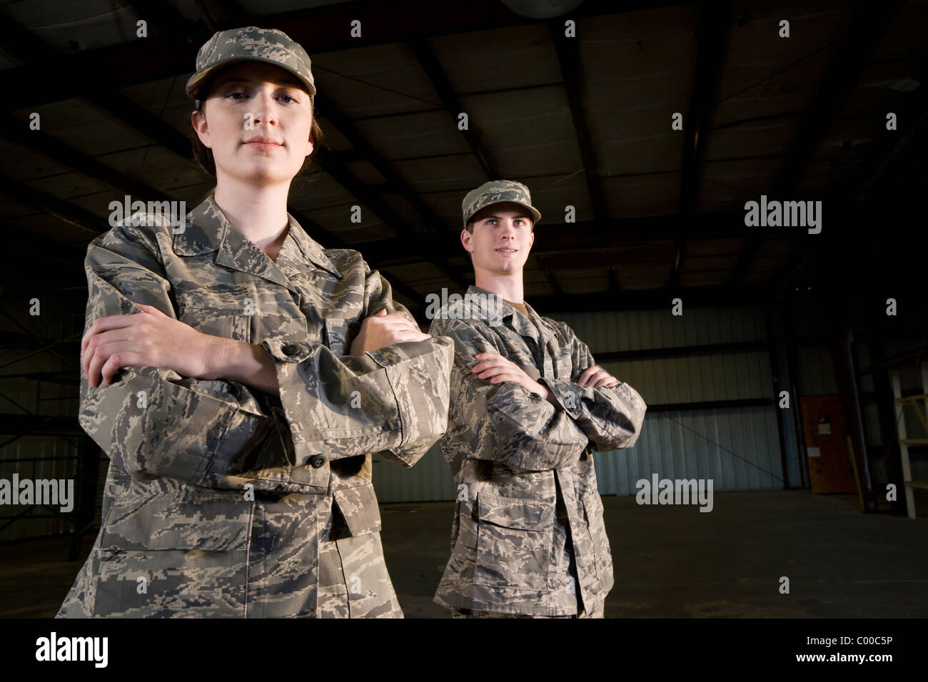 Soldiers in army combat uniform at night Stock Photo - Alamy