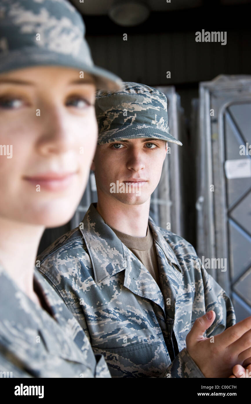 Soldiers in army combat uniform, man in focus Stock Photo - Alamy