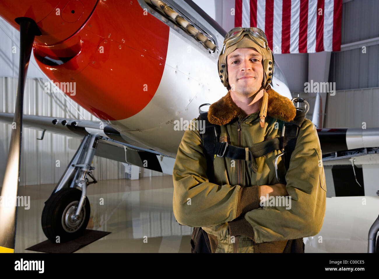 American pilot with vintage fighter plane Stock Photo - Alamy