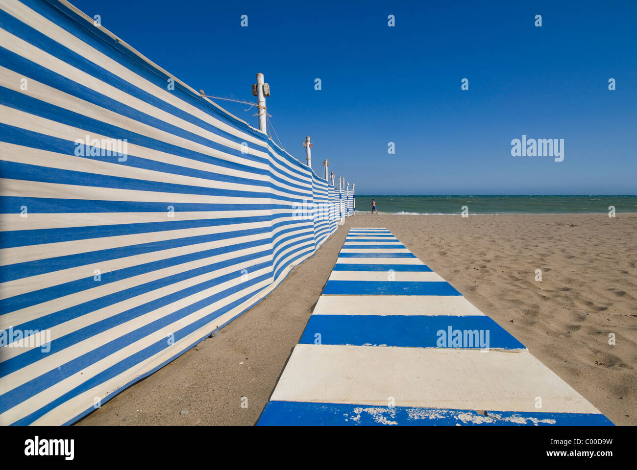 Walkway And Wind Break On Beach Stock Photo - Alamy