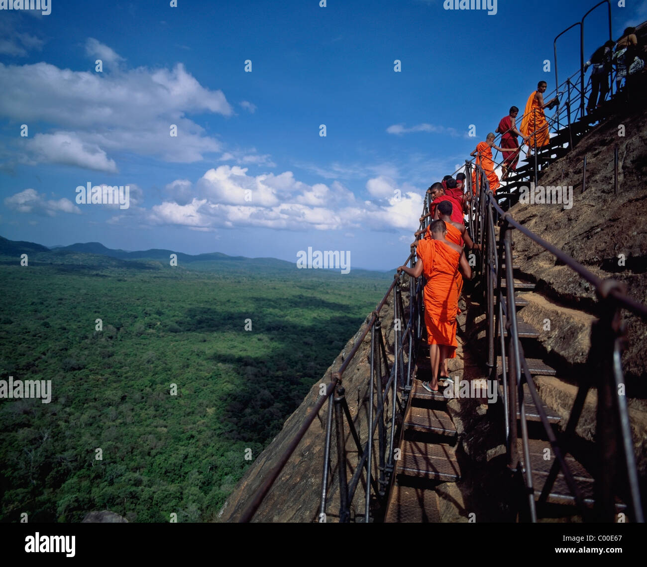Buddhist monks climbing steps of Sigiriya Lion Rock Fortress Stock ...