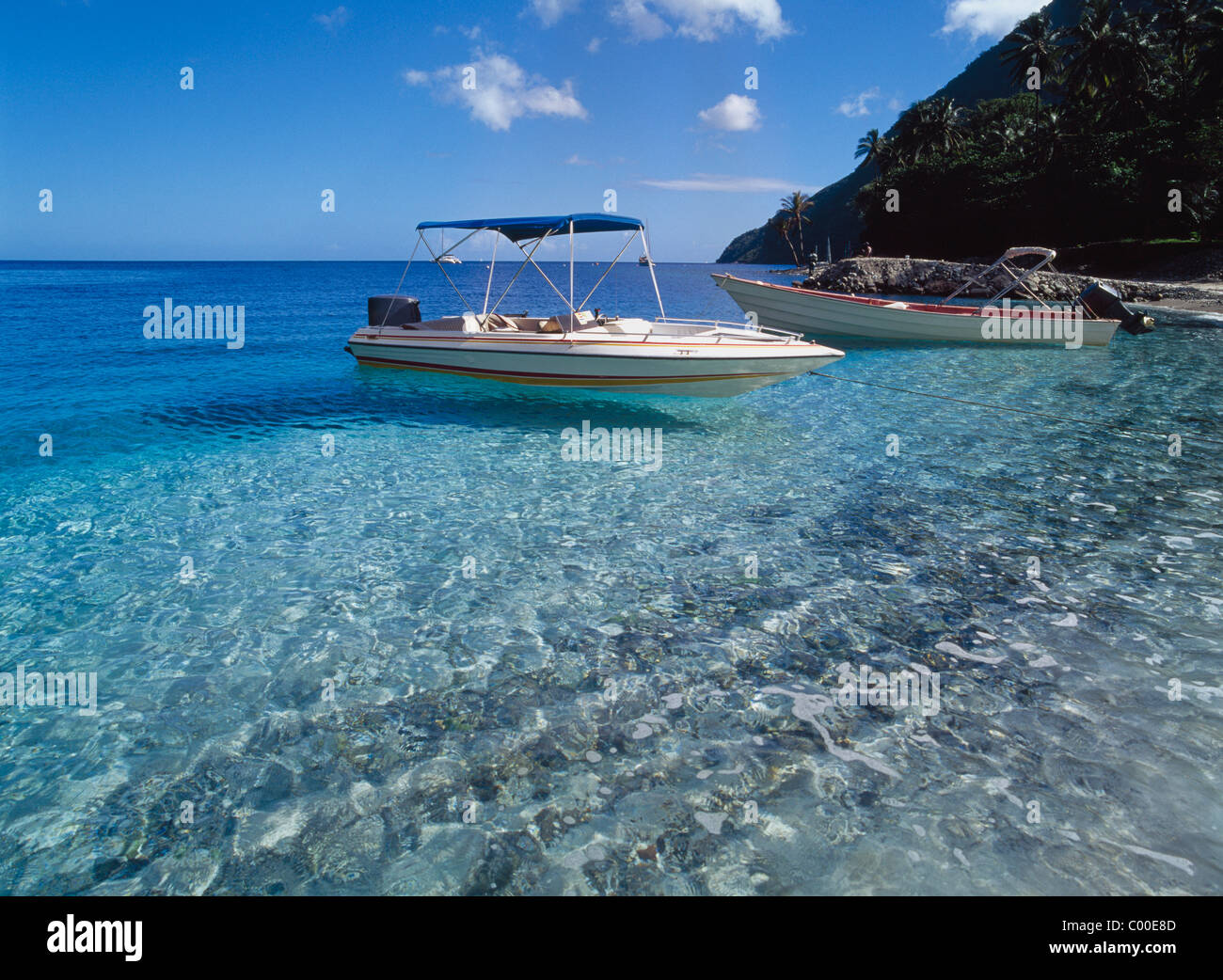 Two boats floating on ocean Stock Photo - Alamy