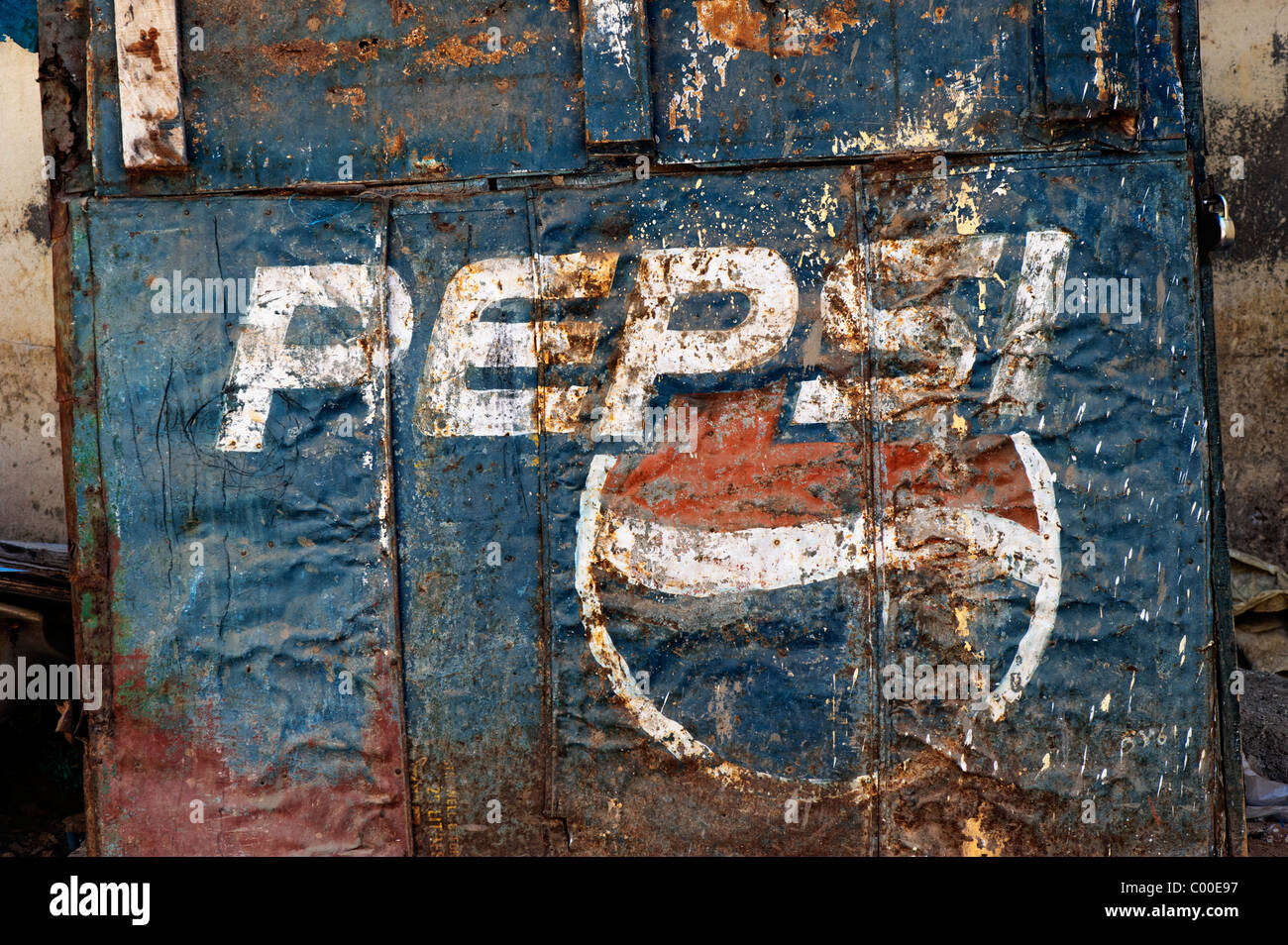Old hand painted pepsi advertisement on a shack on the roadside in ...