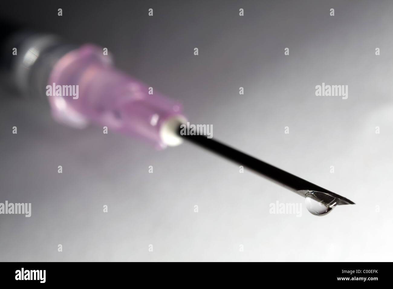 Syringe needle drop clear liquid hi-res stock photography and images ...