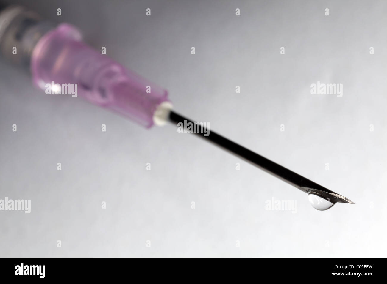 Syringe needle drop clear liquid hi-res stock photography and images ...