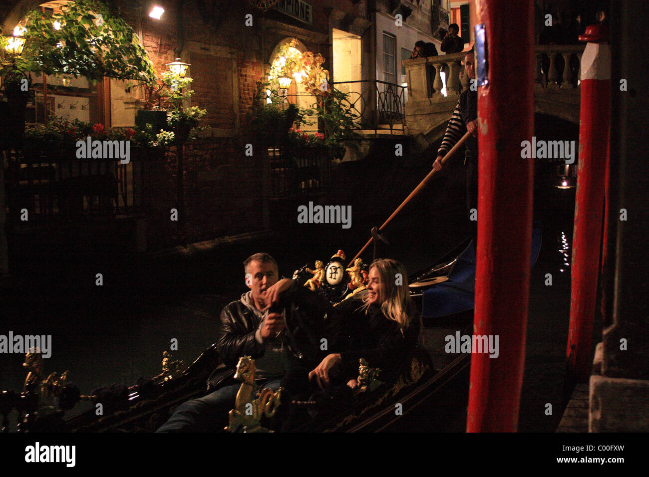 Gondola ride at night, Venice Stock Photo - Alamy
